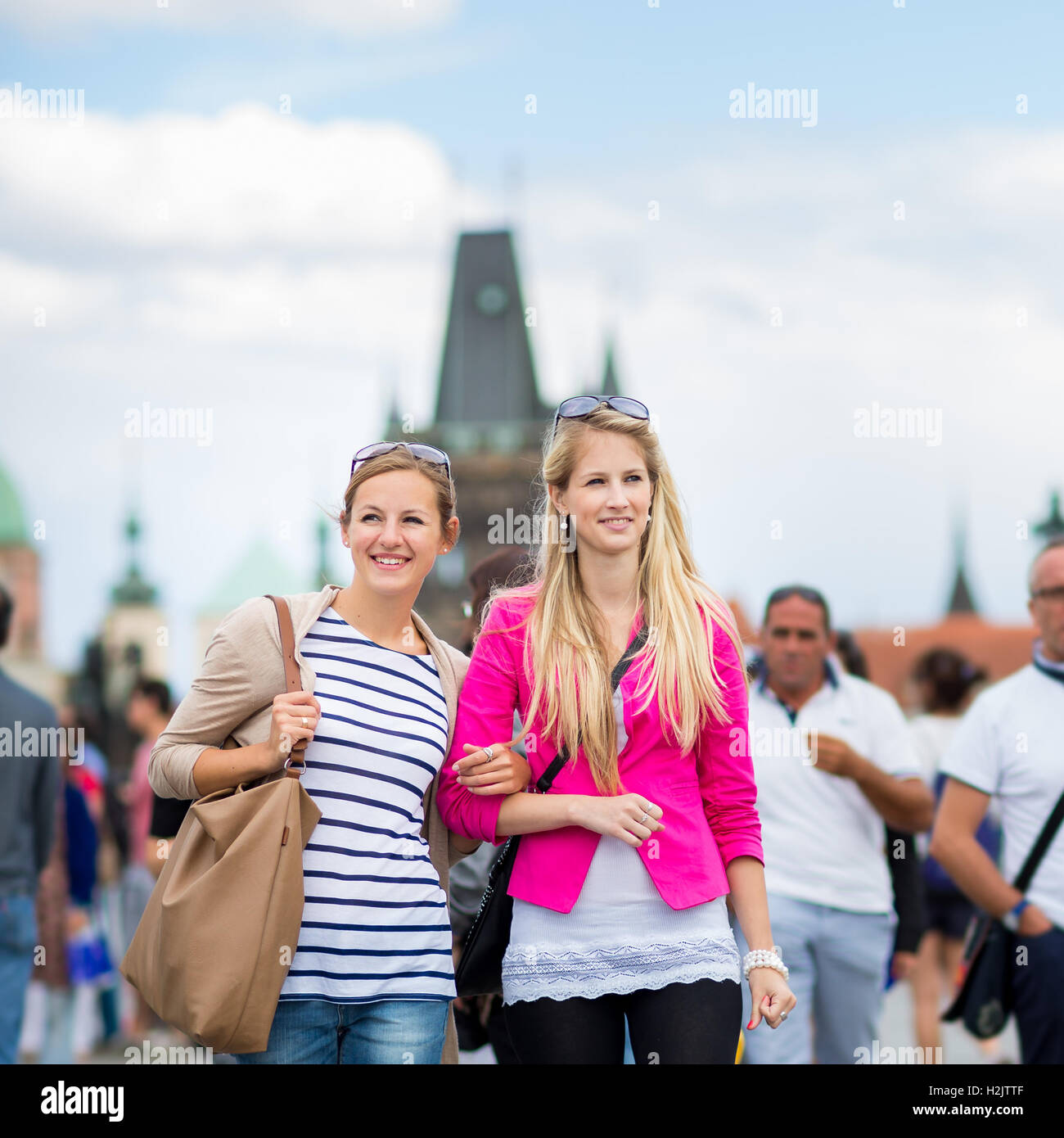 Two pretty, young women sightseeing in Prague historic center Stock ...