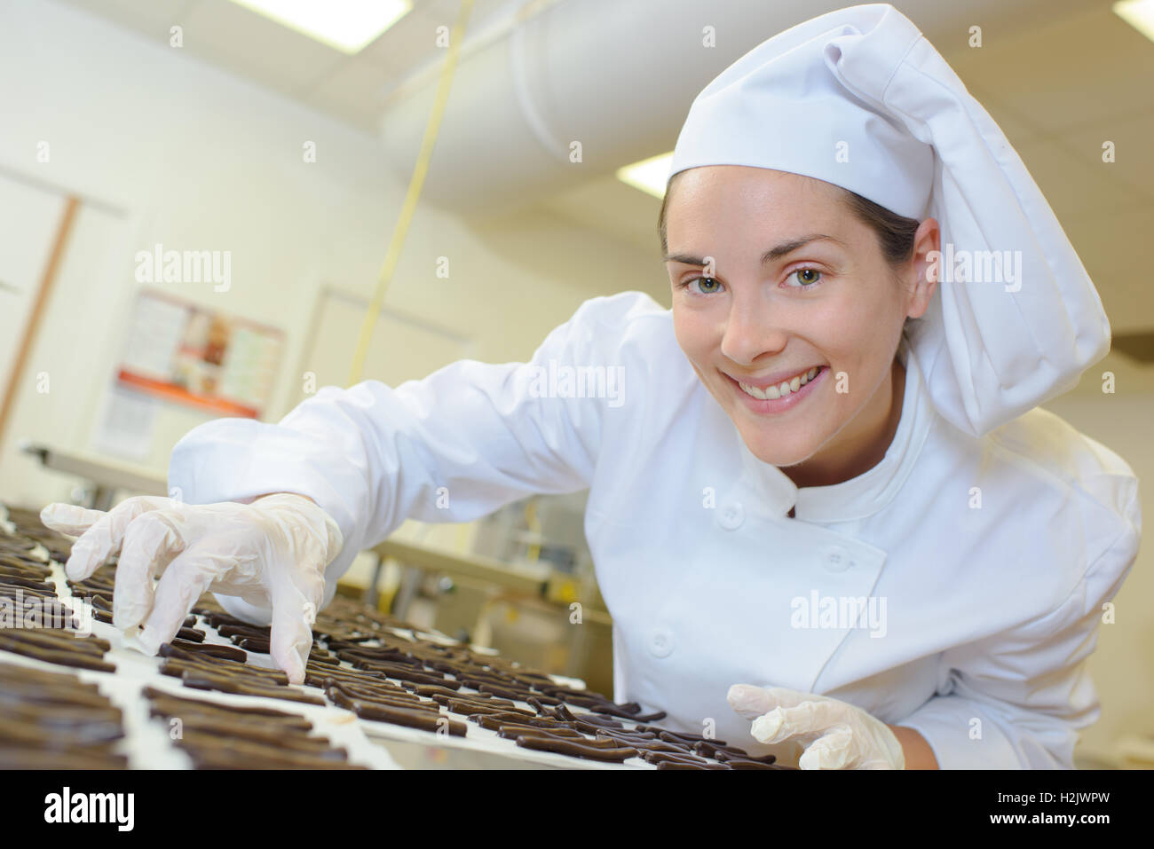 Chef arranging cookies Stock Photo - Alamy