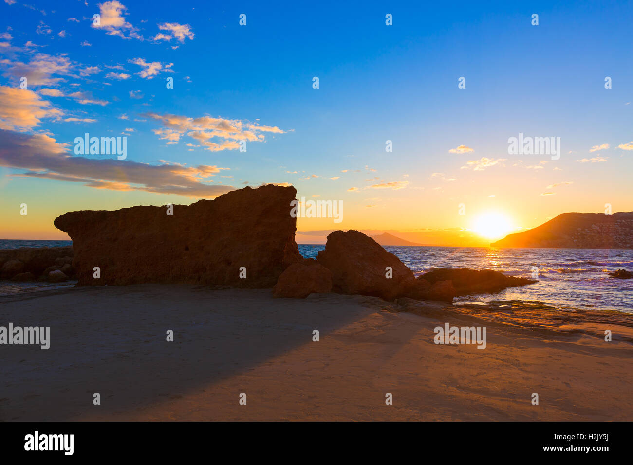 Calpe Alicante sunset at beach Cantal Roig in Spain Stock Photo - Alamy