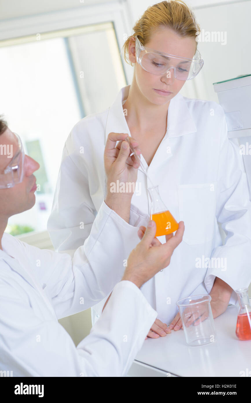 Two lab technicians at work Stock Photo - Alamy