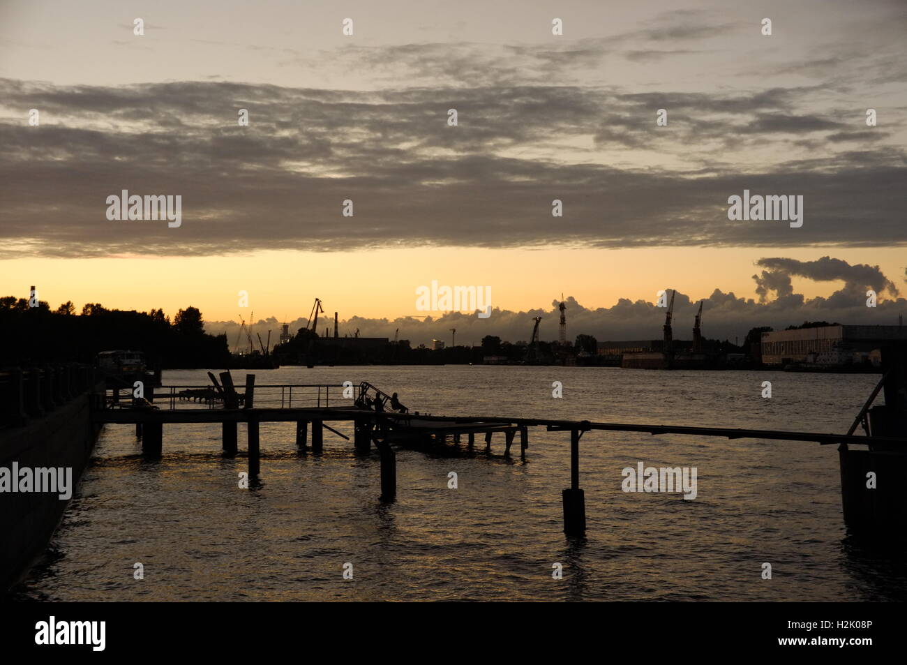 Sunset on a river Stock Photo - Alamy