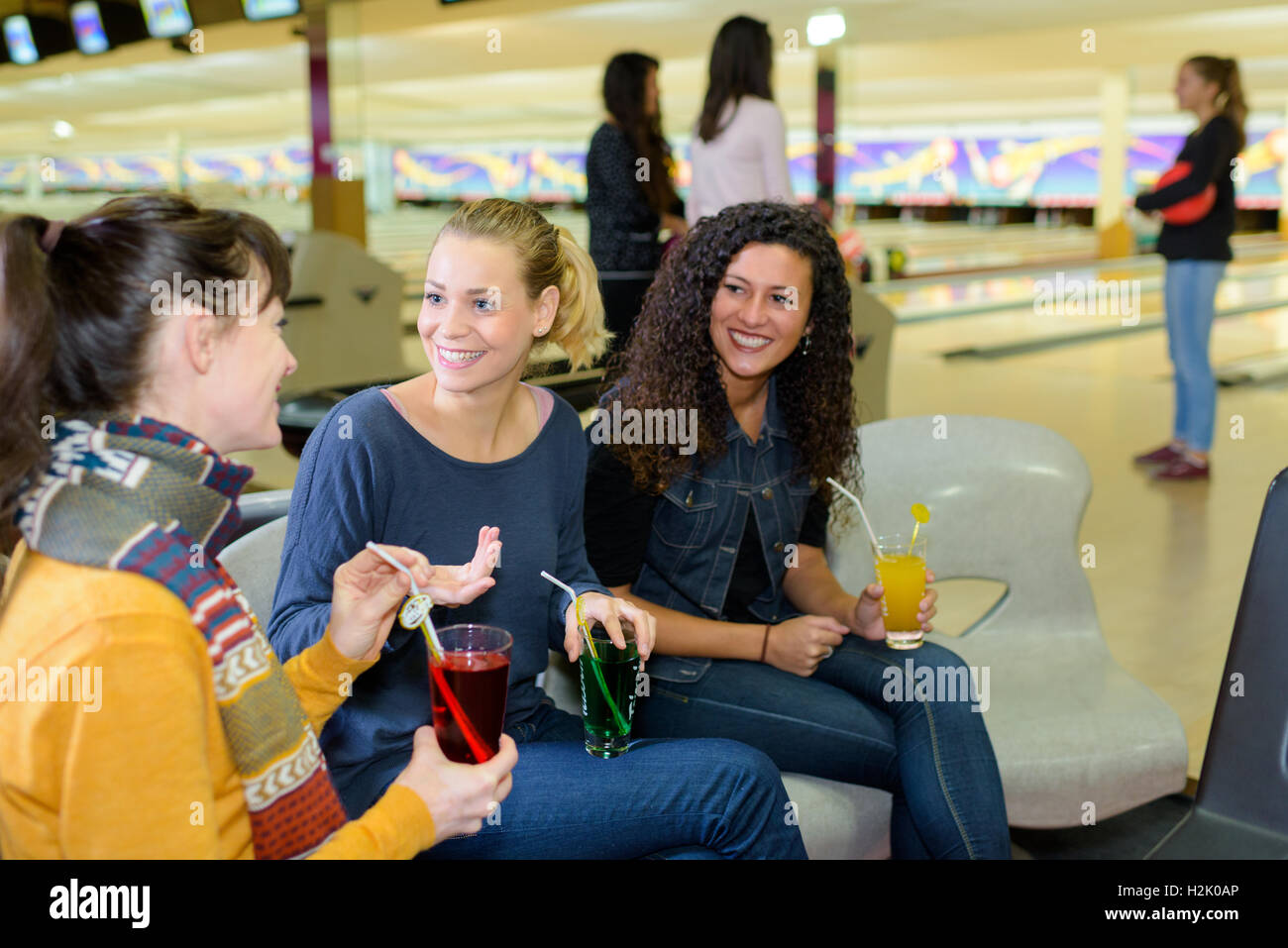 friends on a funny conversation Stock Photo - Alamy