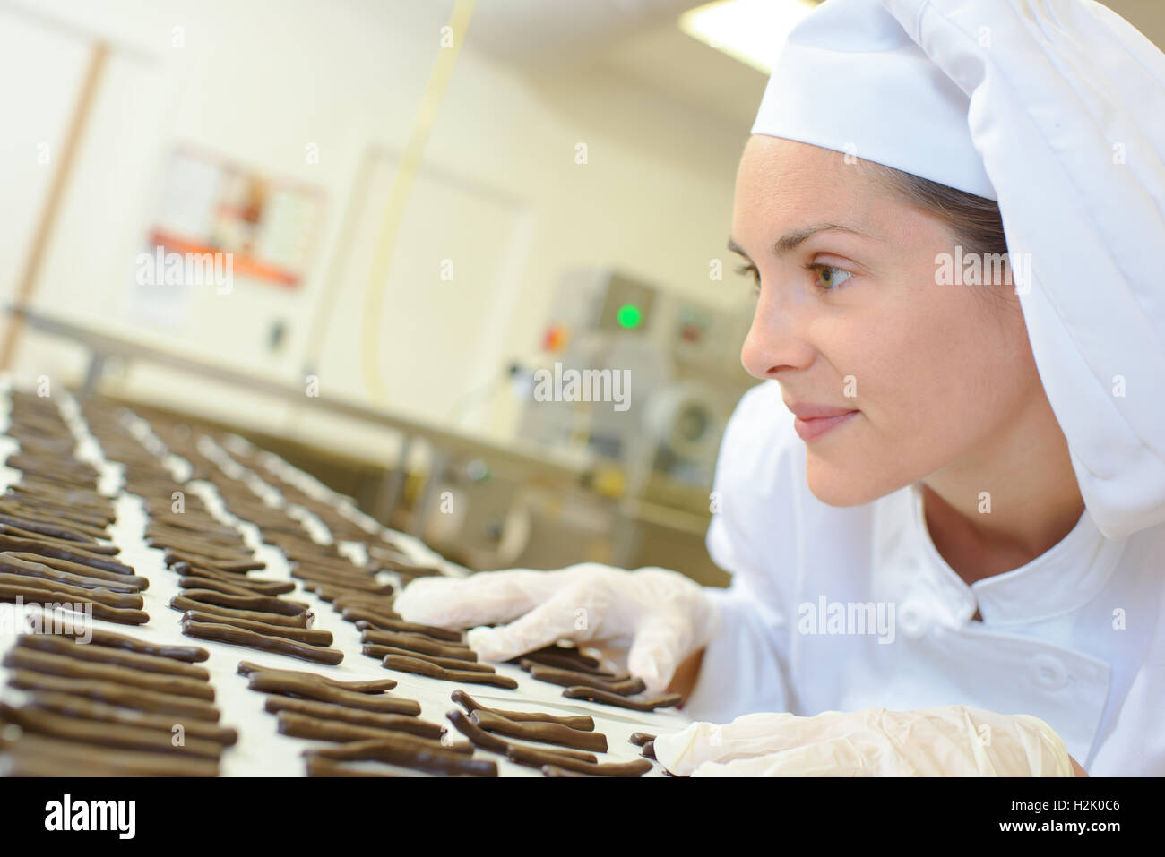 chef with chocolate pretzels Stock Photo - Alamy