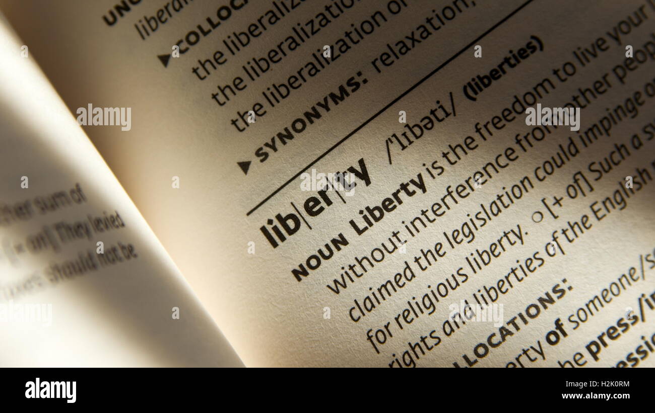 liberty word written in open book Stock Photo - Alamy