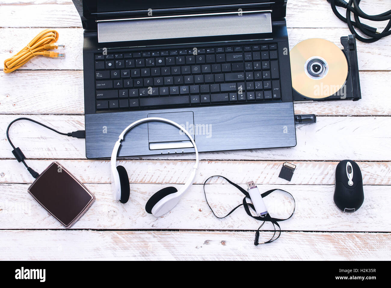 Computer Peripherals & Laptop Accessories. Composition on white wooden ...