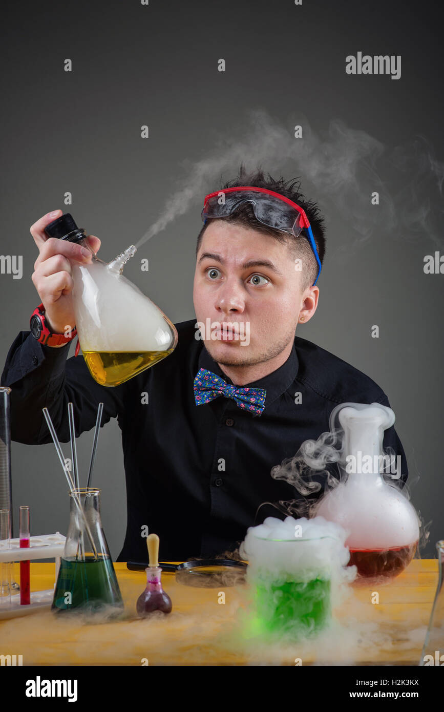 magician in chemical laboratory prepares magical solution Stock Photo ...