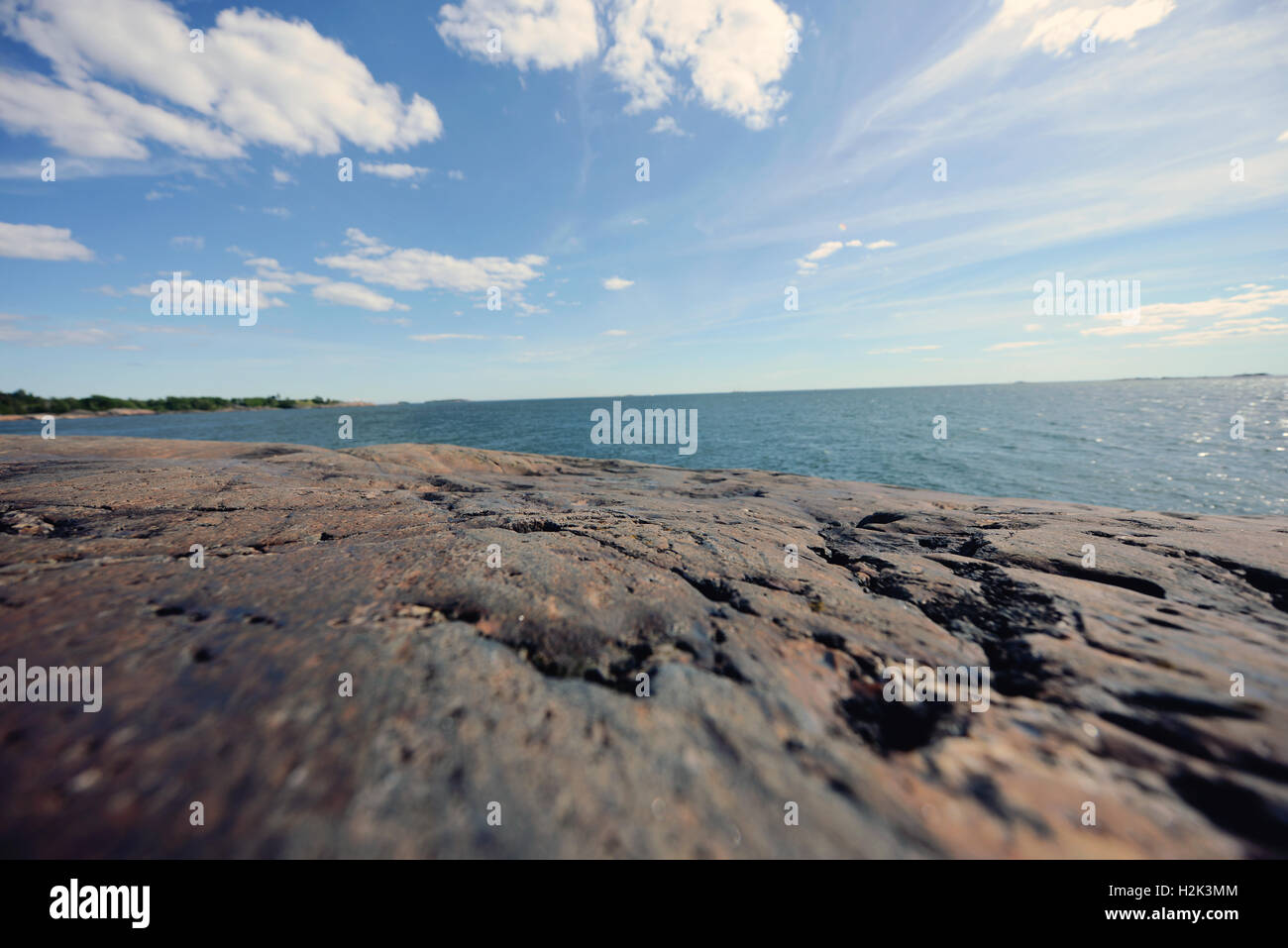 view from the sea shore stone Stock Photo - Alamy