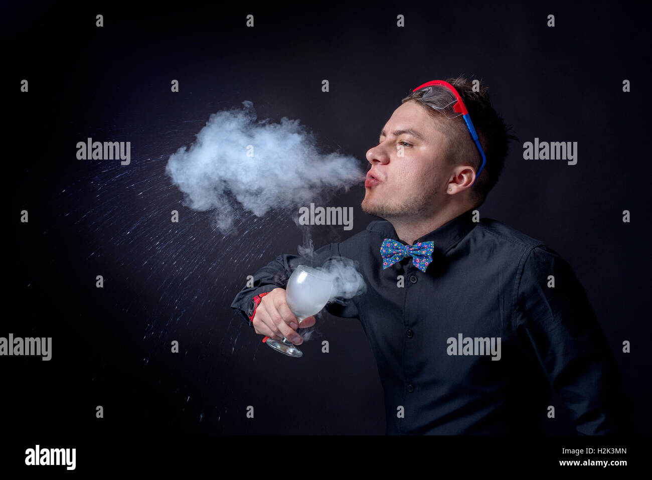 magician in chemical laboratory prepares magical solution Stock Photo ...