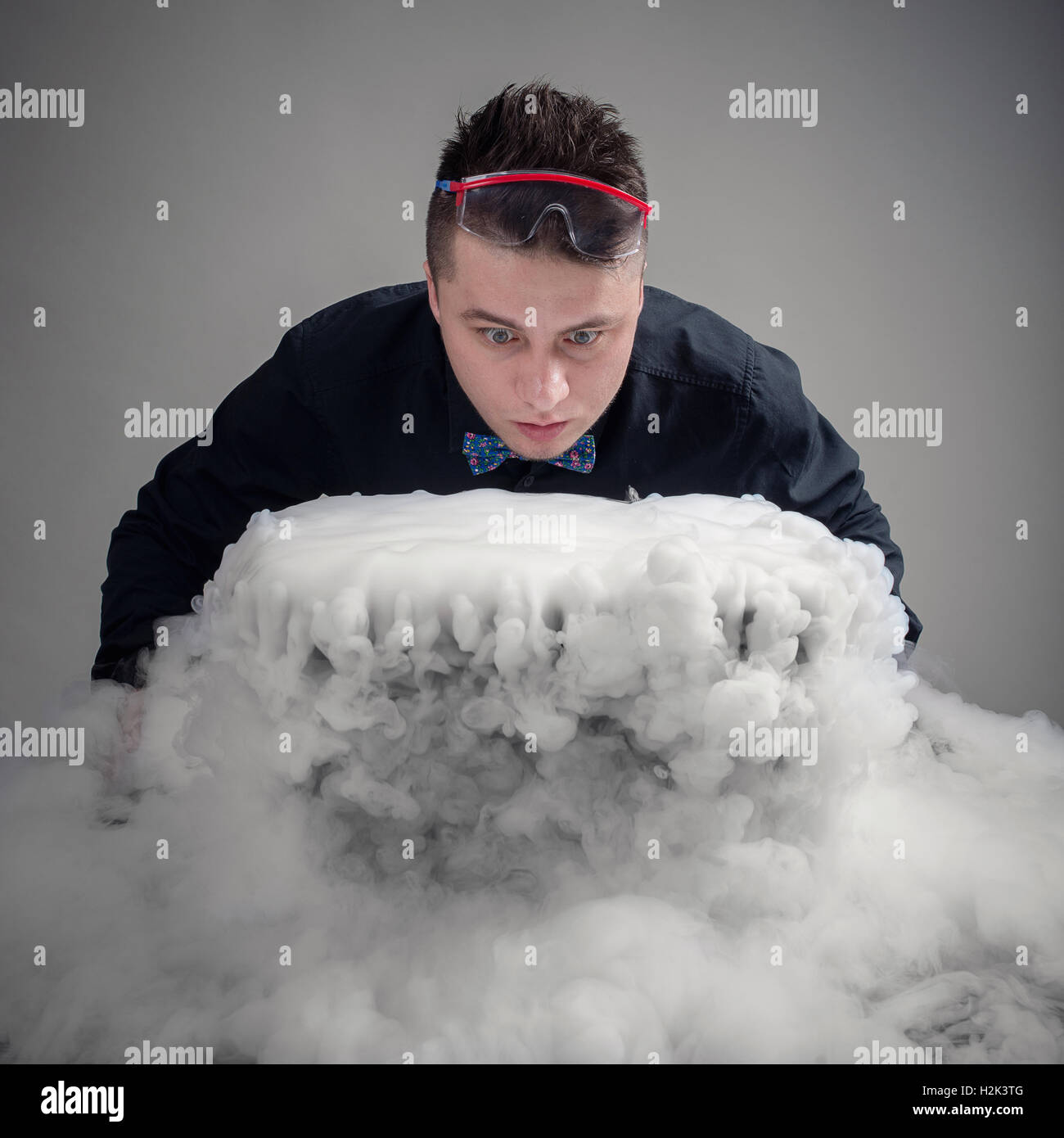 magician in chemical laboratory prepares magical solution Stock Photo ...