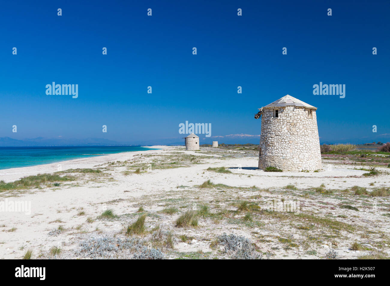 Windmill at Gyra beach, Lefkada, Greece Stock Photo - Alamy