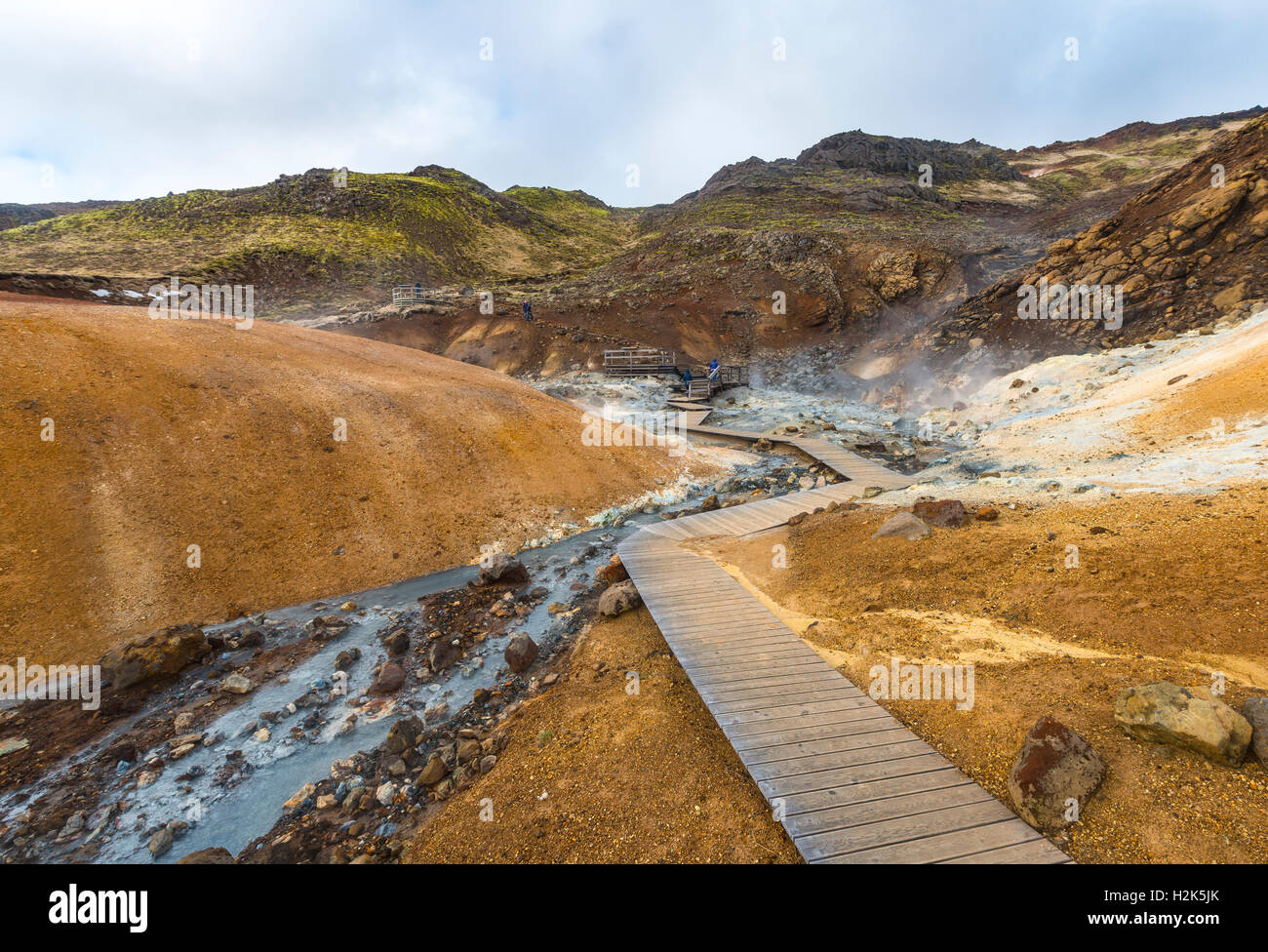Boardwalk over steaming ground, mineral deposits, Seltún geothermal ...