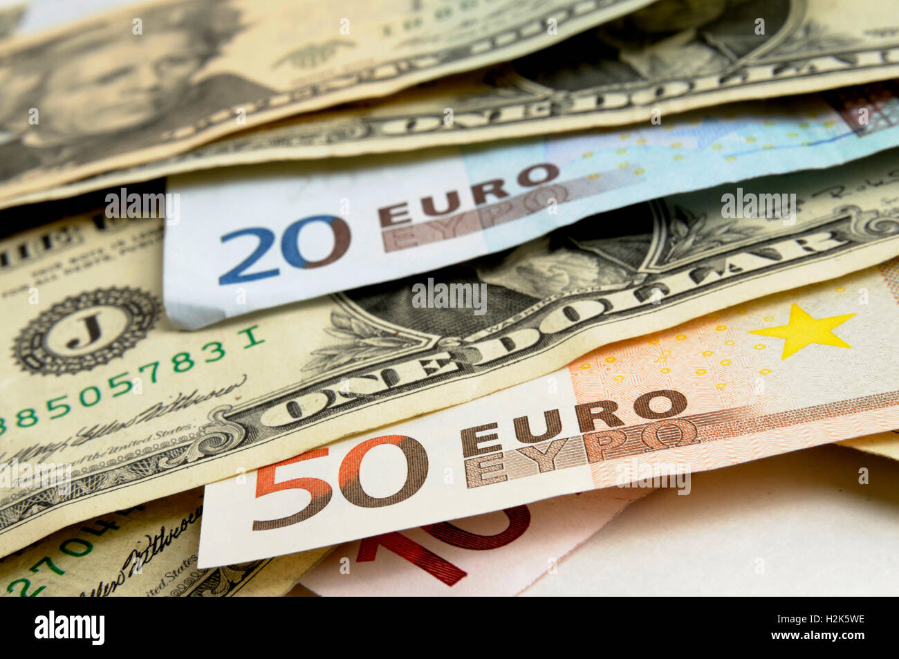 Dollars and euro banknotes Stock Photo - Alamy