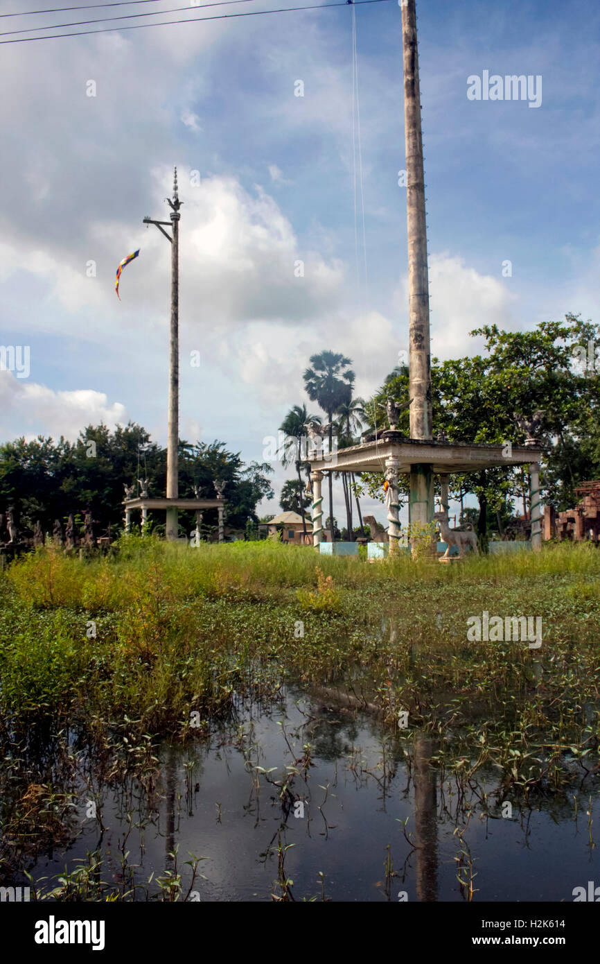 A pond used for irrigation is part of the Wat Nokor Temple complex in ...