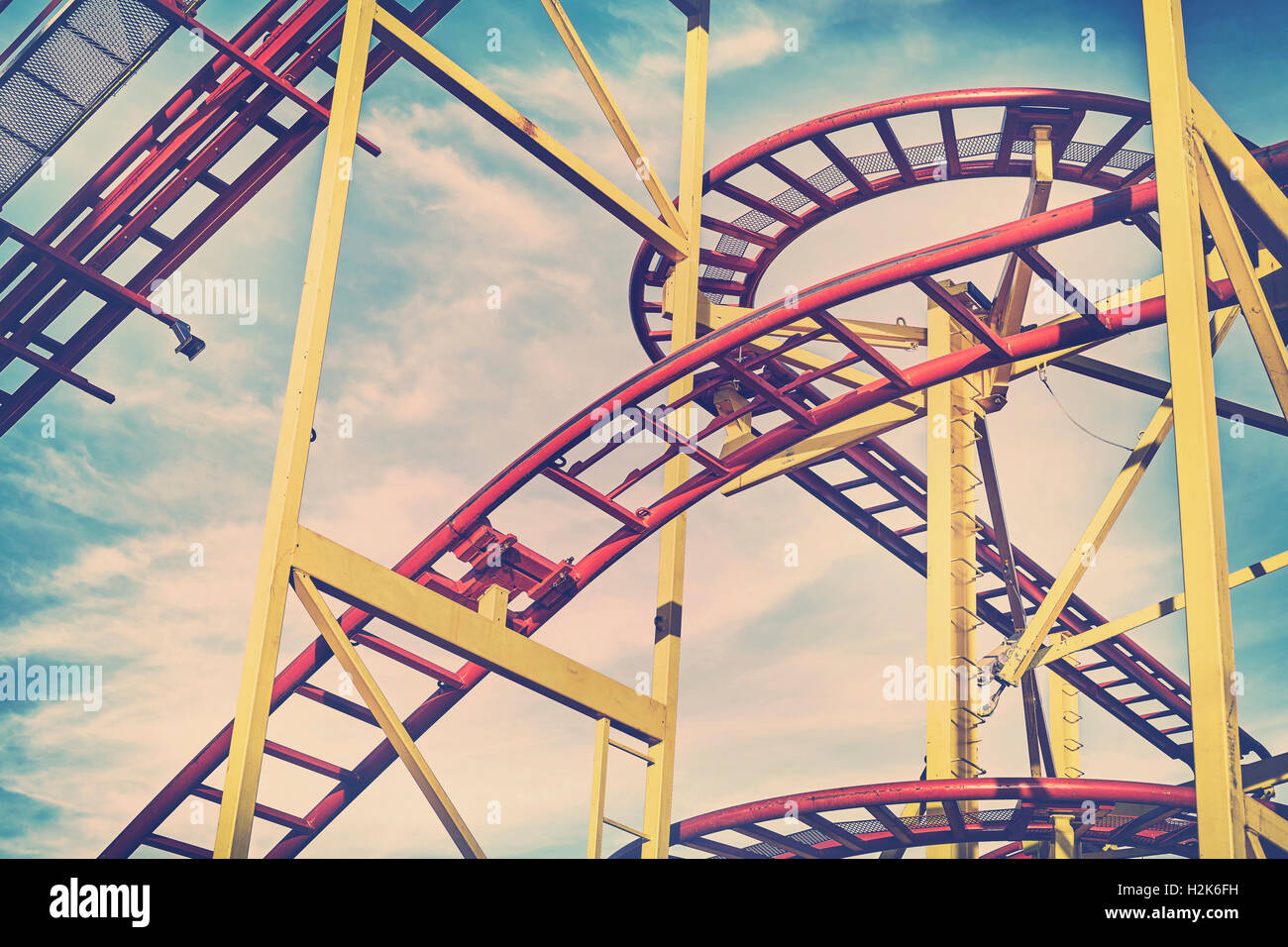 Vintage toned roller coaster construction in an amusement park Stock ...