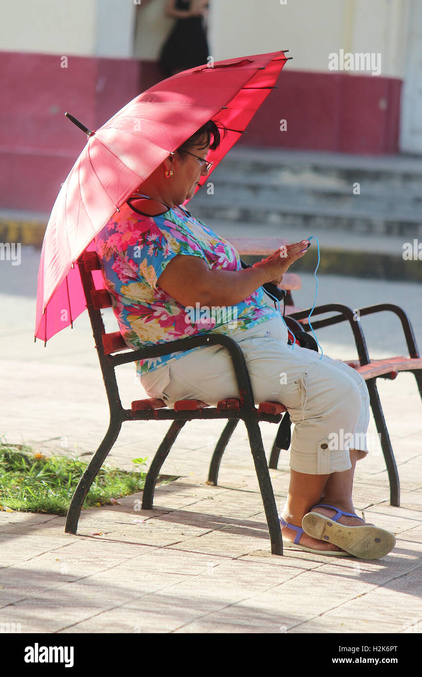 lady under umbrella Stock Photo - Alamy