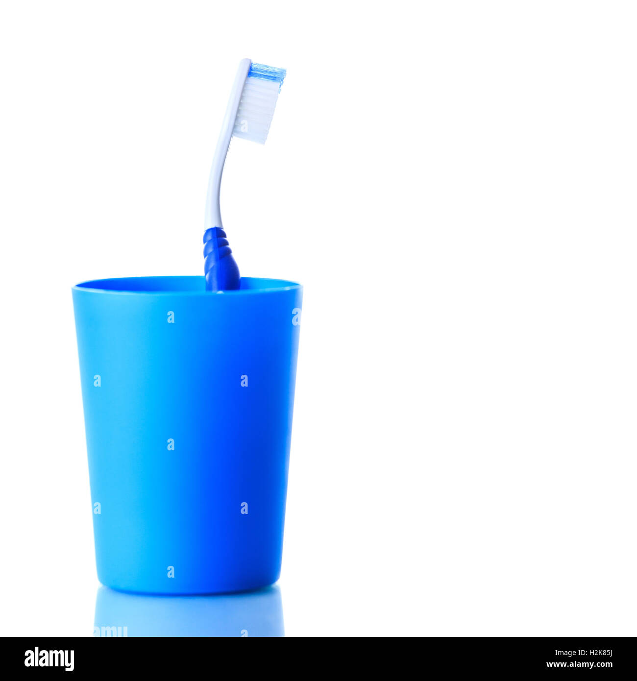 Blue toothbrush toothpaste white Cut Out Stock Images & Pictures - Alamy