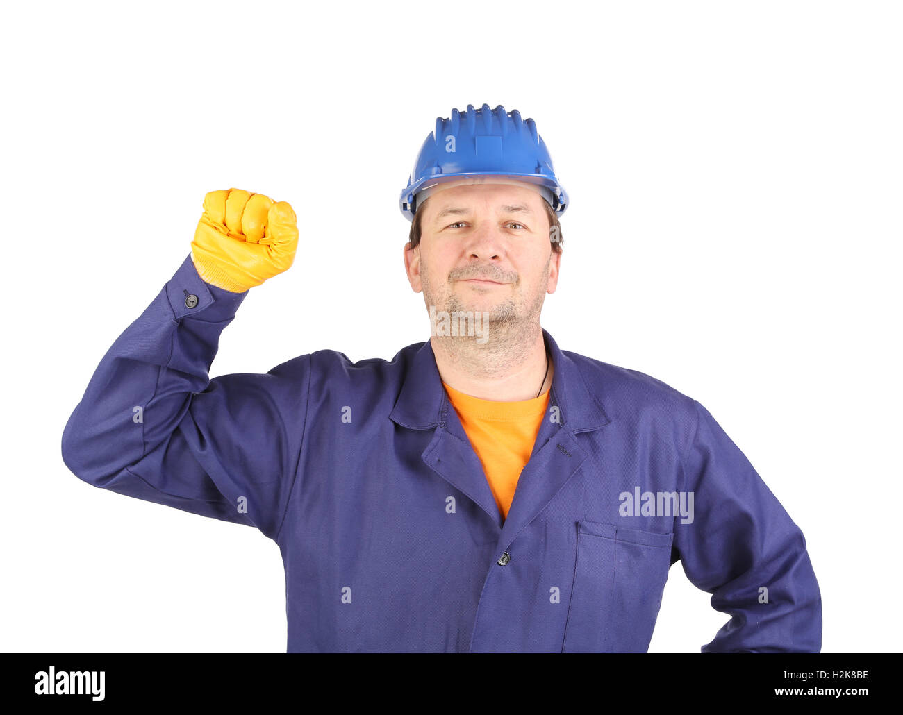 Worker with clenched fist Stock Photo - Alamy
