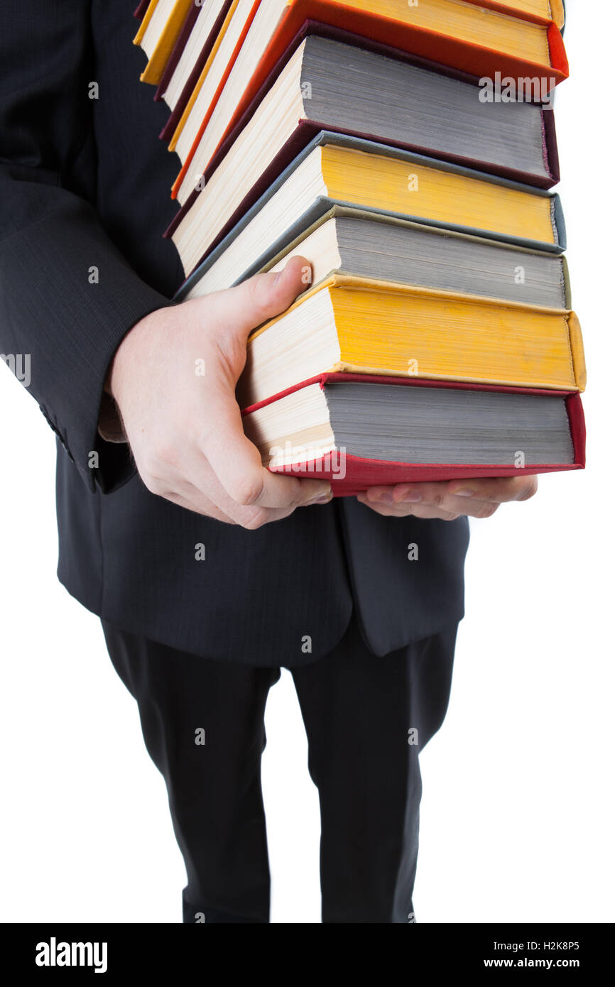 man holding a stack of books Stock Photo - Alamy