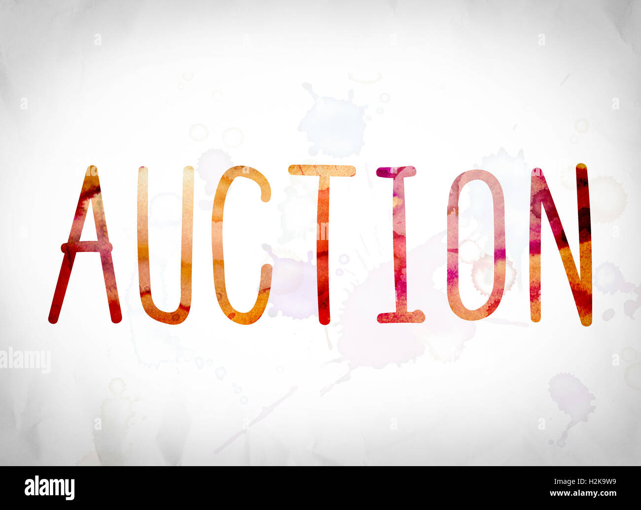 The word "Auction" written in watercolor washes over a white paper ...