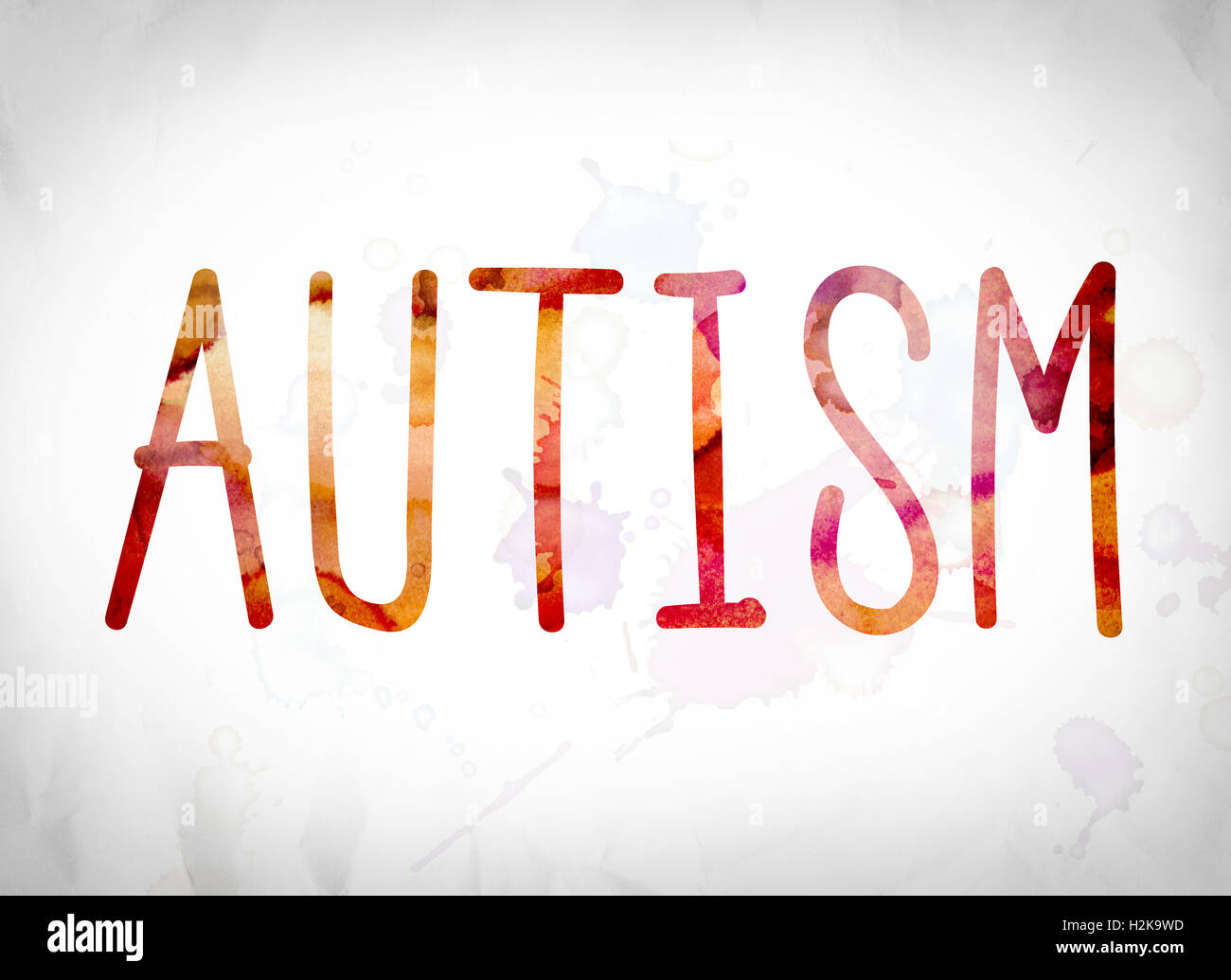 The word "Autism" written in watercolor washes over a white paper ...