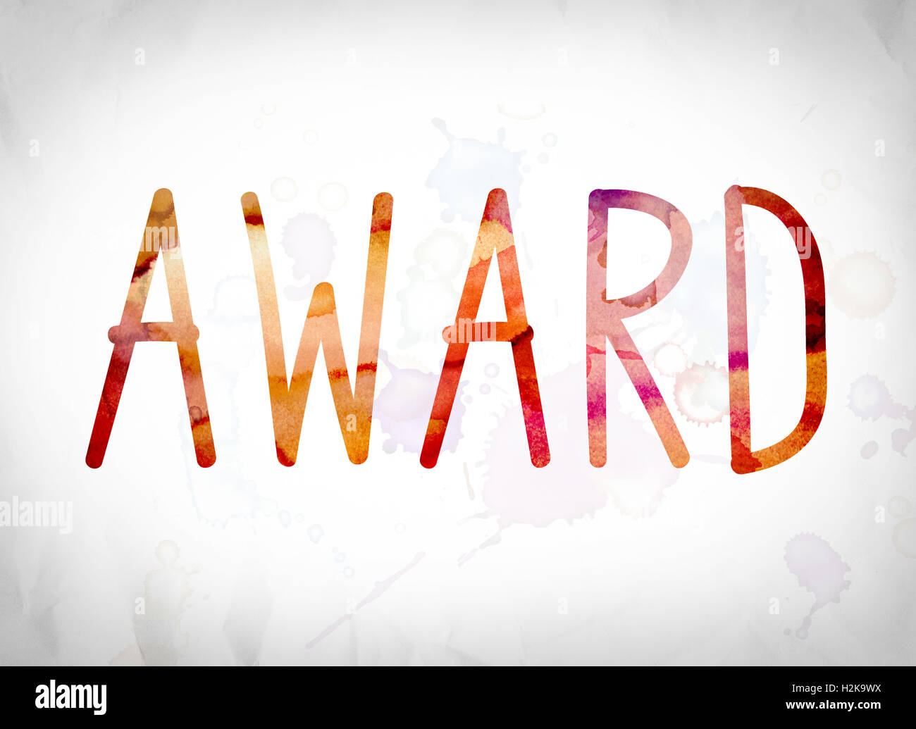 The word "Award" written in watercolor washes over a white paper ...
