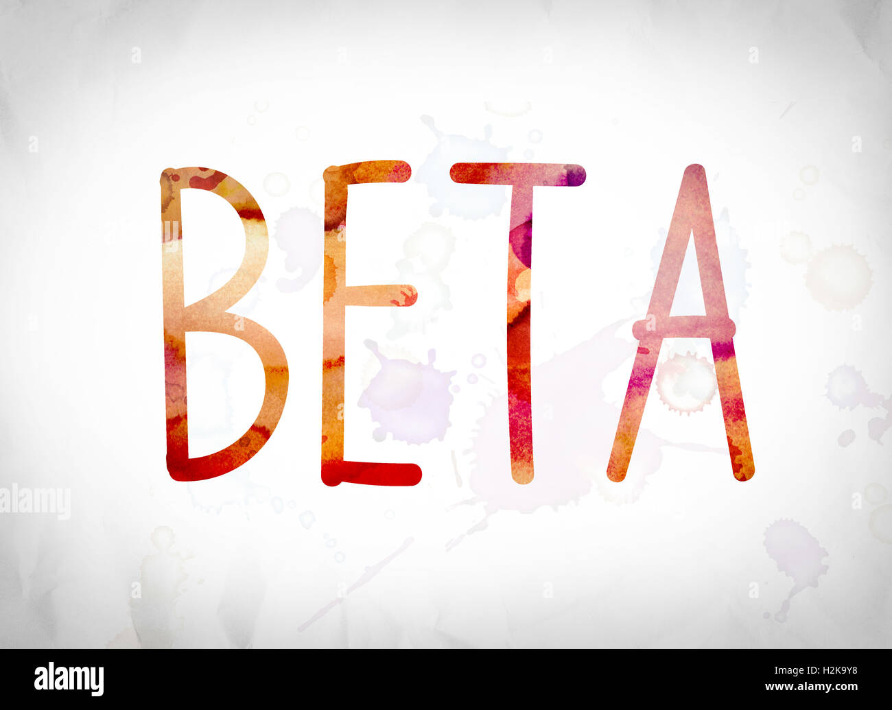 The word "Beta" written in watercolor washes over a white paper ...