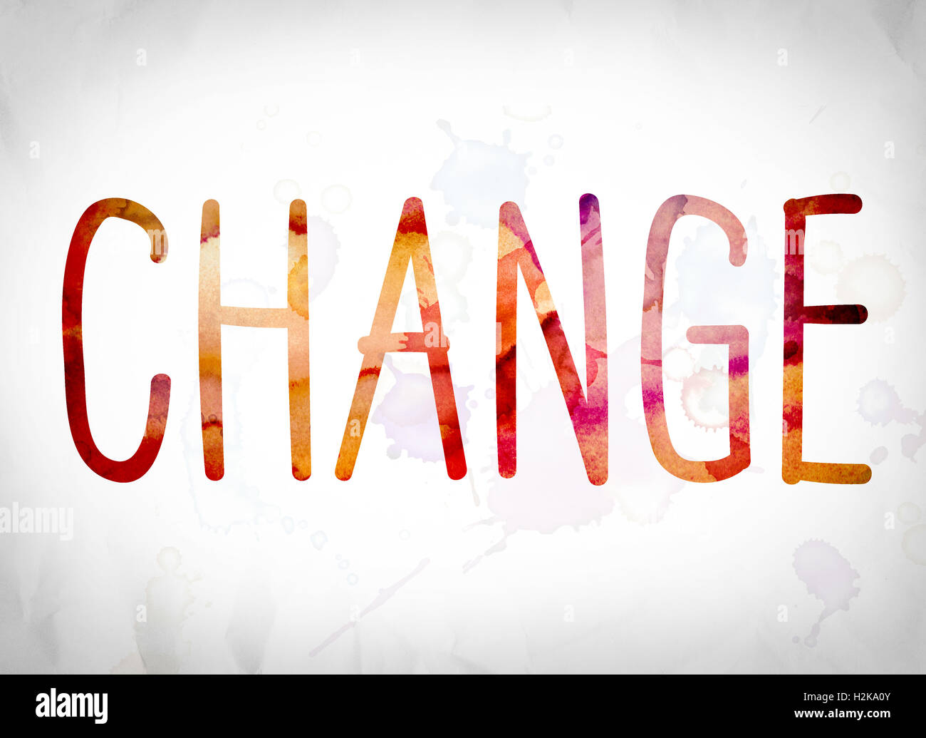 The word "Change" written in watercolor washes over a white paper ...