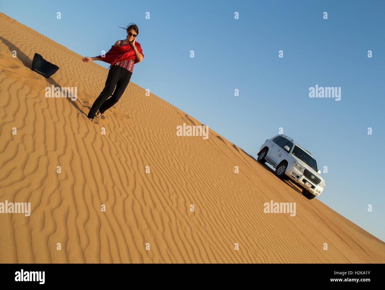 A model is falling when a jeep accidentally passes by on a desert ...