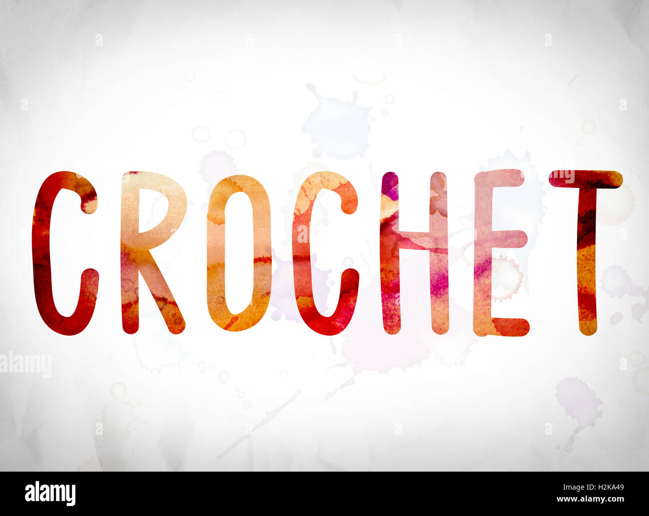 The word "Crochet" written in watercolor washes over a white paper ...