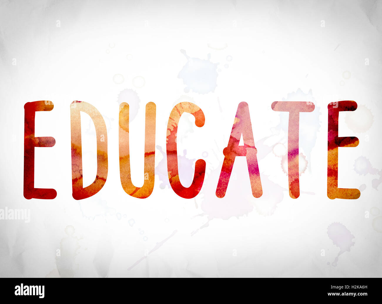The word "Educate" written in watercolor washes over a white paper ...