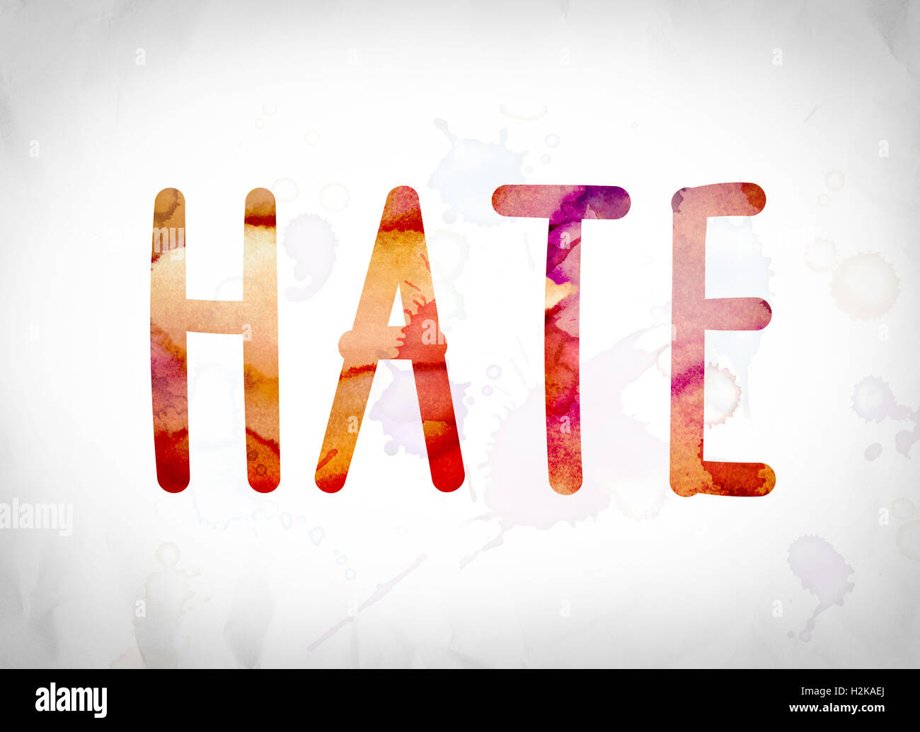 The word "Hate" written in watercolor washes over a white paper ...