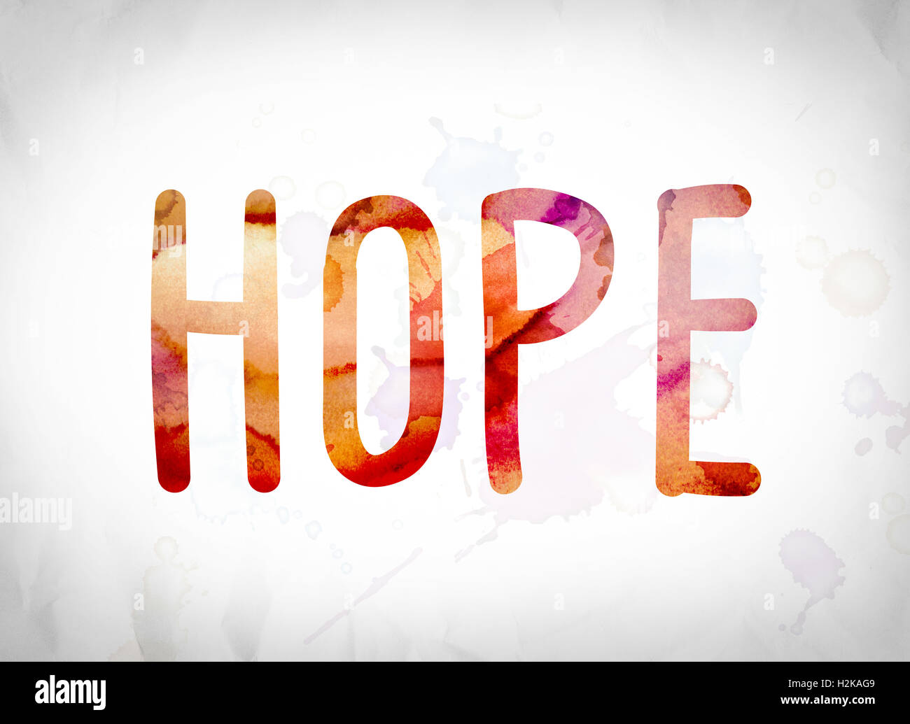 The word "Hope" written in watercolor washes over a white paper ...