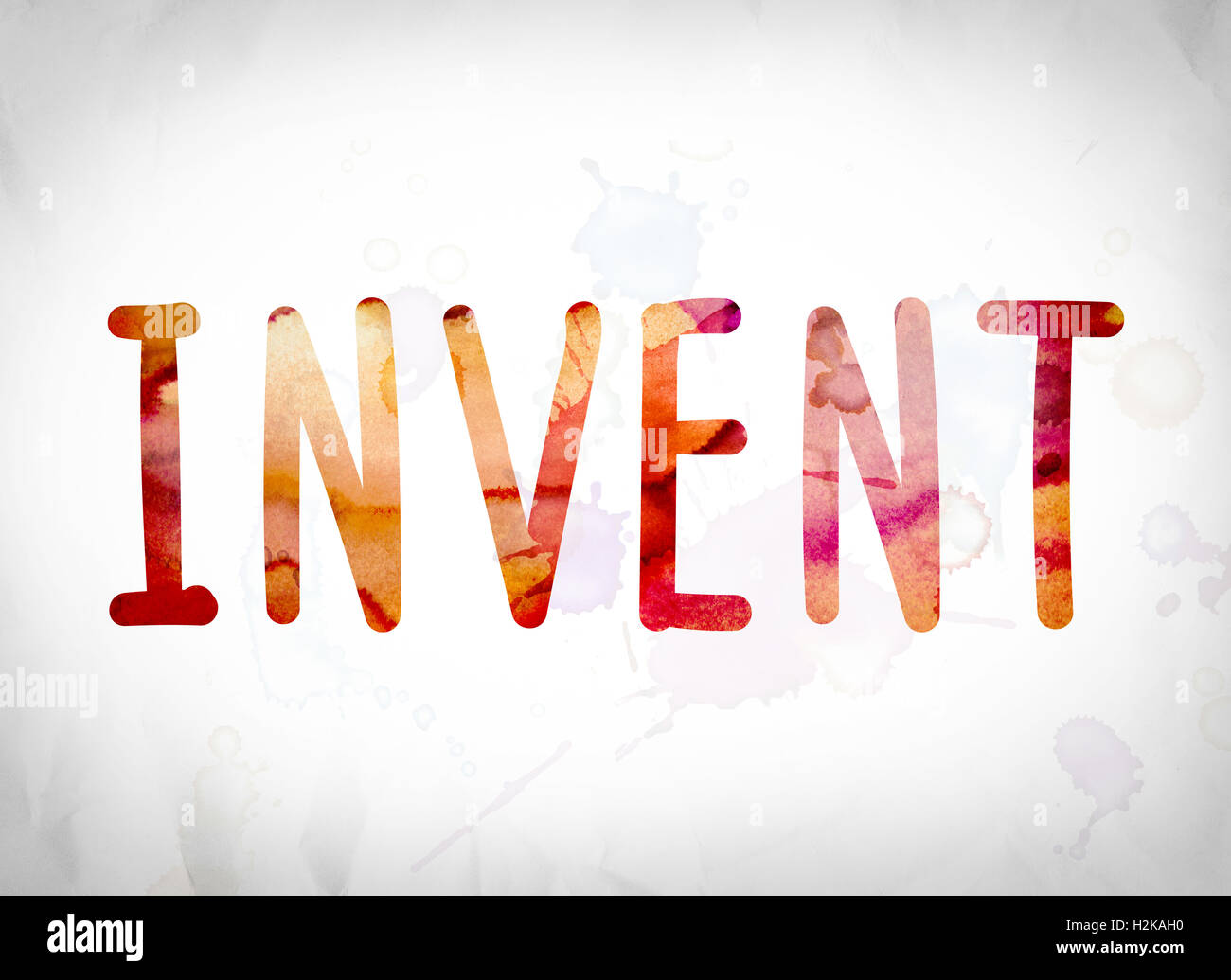 The word "Invent" written in watercolor washes over a white paper ...