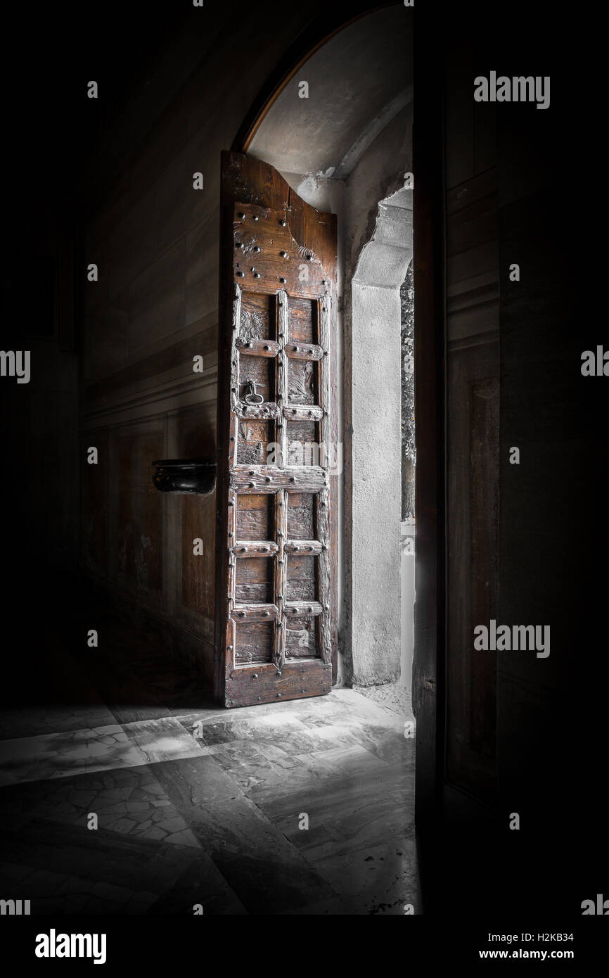 Light entering through gate in old church, peaceful moment Stock Photo ...