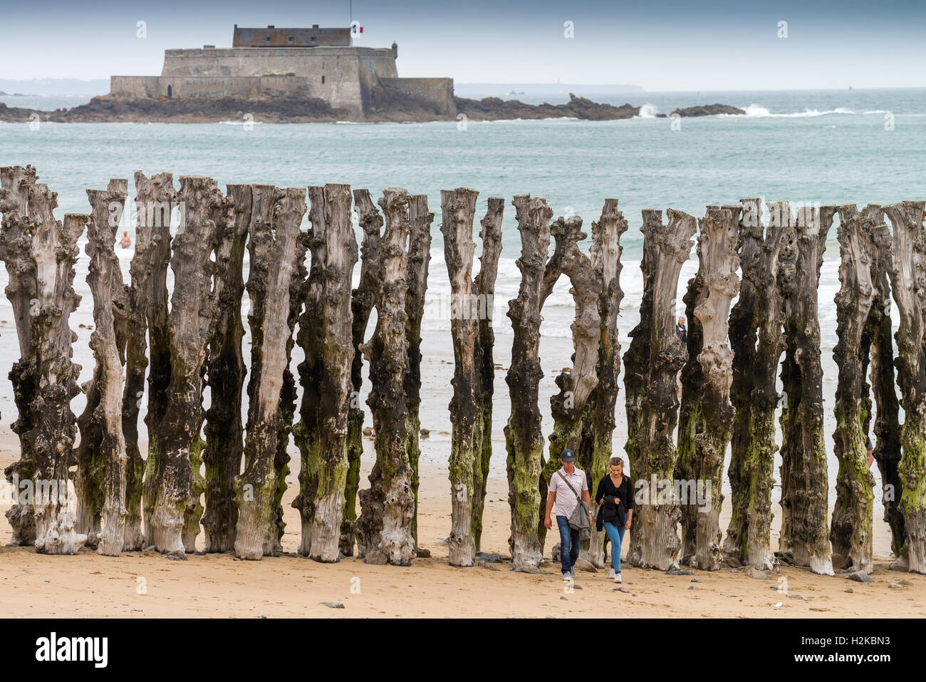 Atlantic beach under the towers of city walls in St Malo in English ...