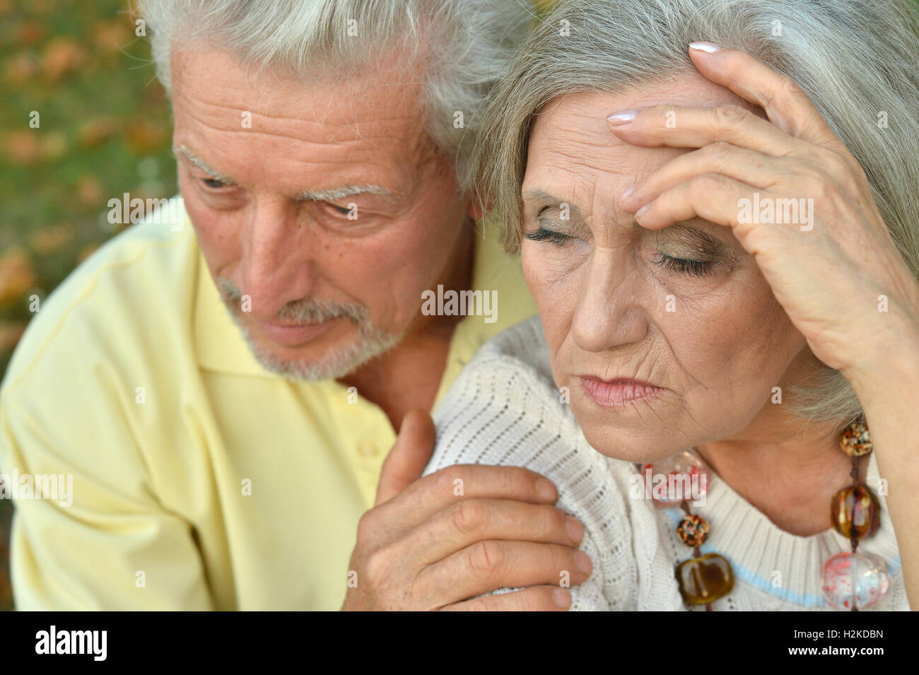 Sad senior couple Stock Photo - Alamy