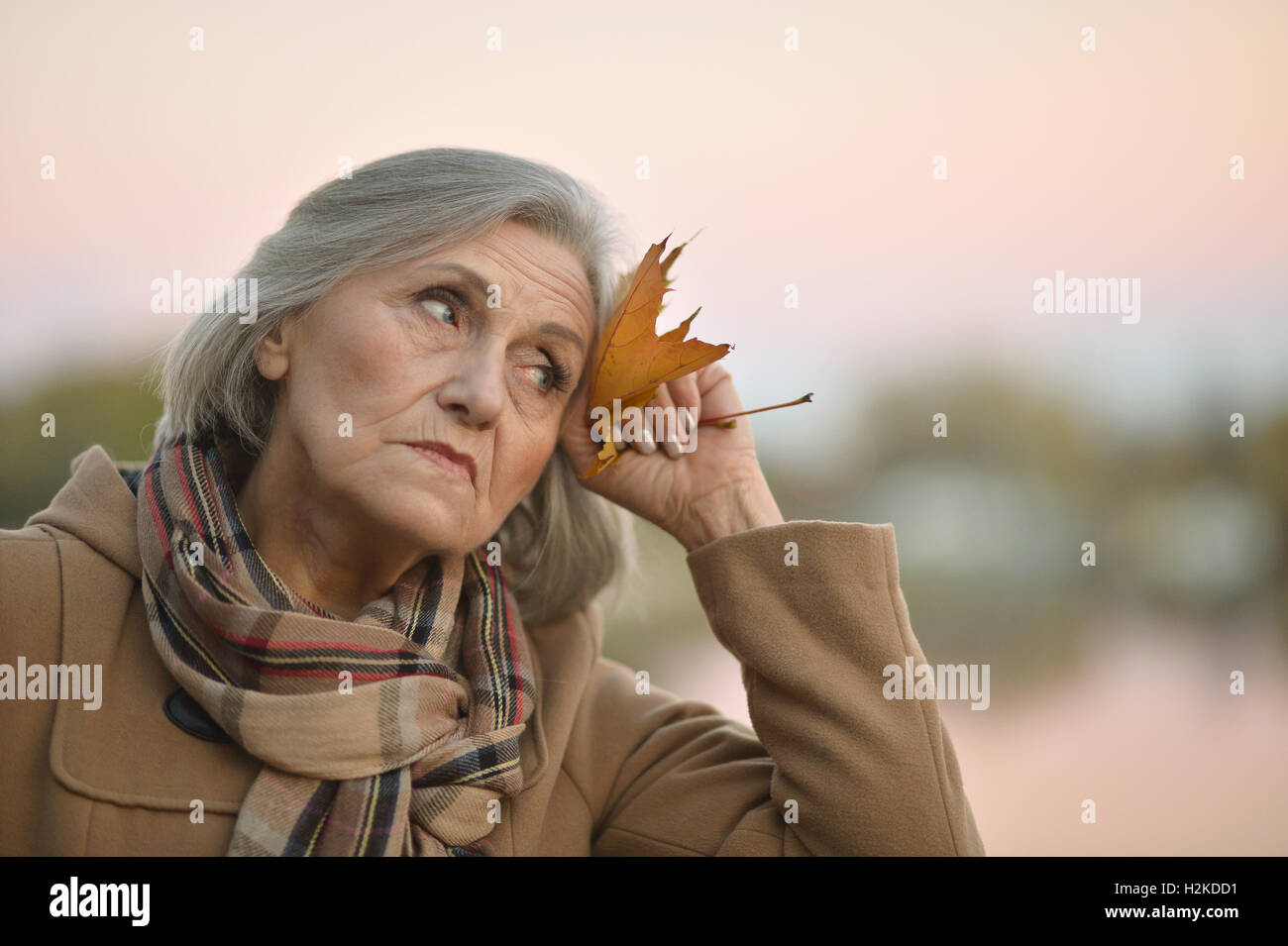 Nice sad old woman Stock Photo - Alamy