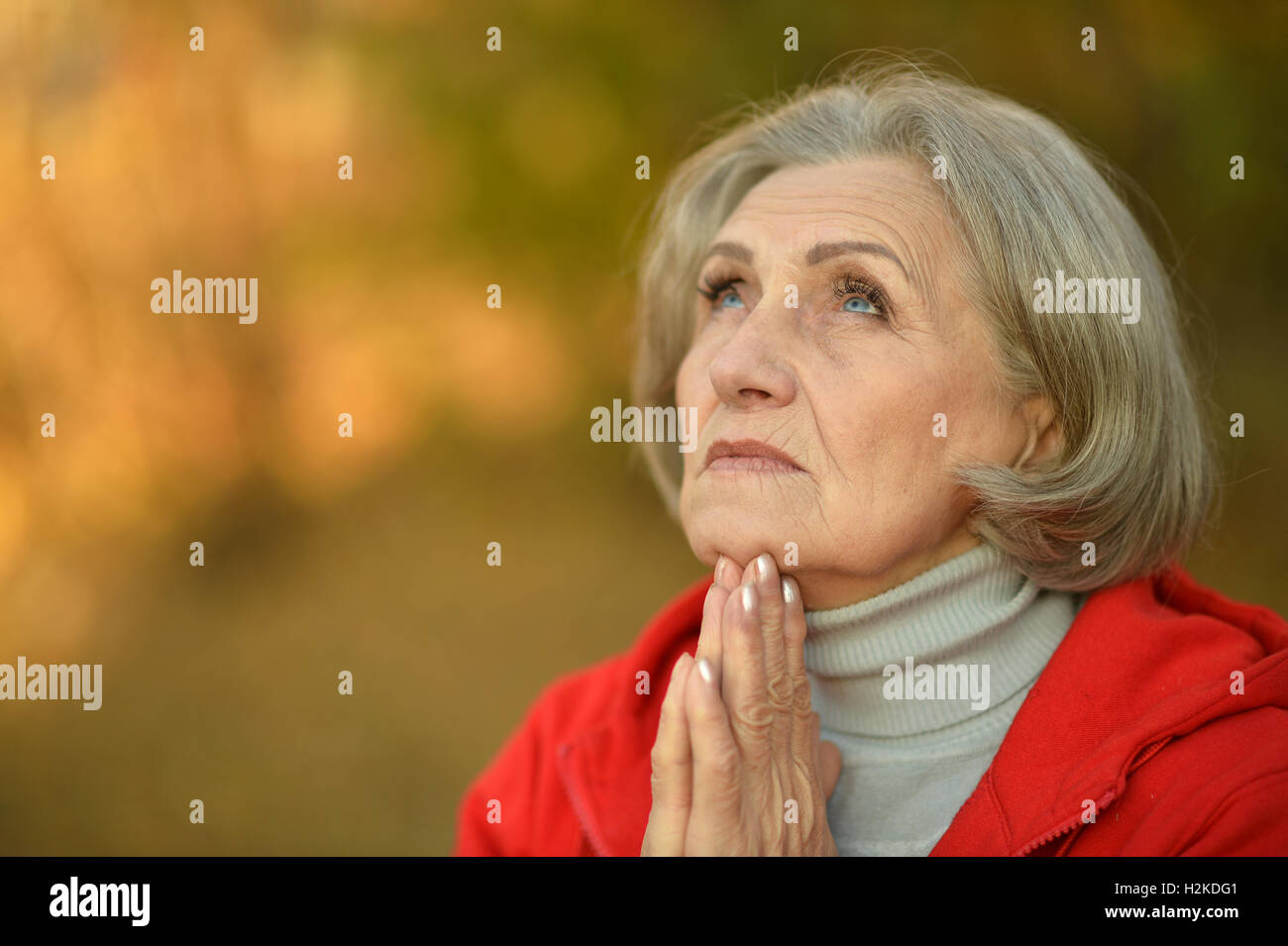Nice sad old woman Stock Photo - Alamy