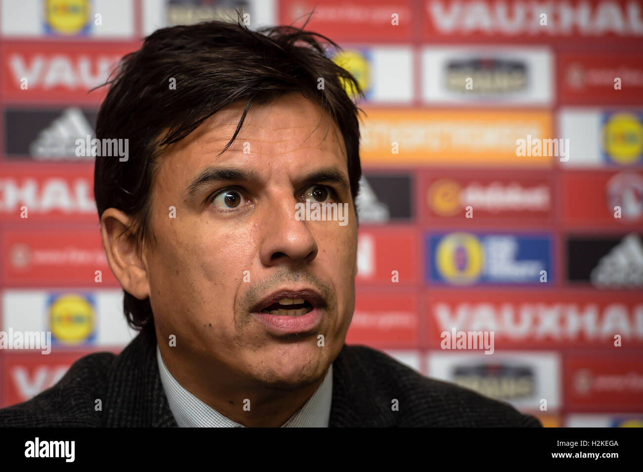 Wales' football team manager Chris Coleman speaks to the media during ...