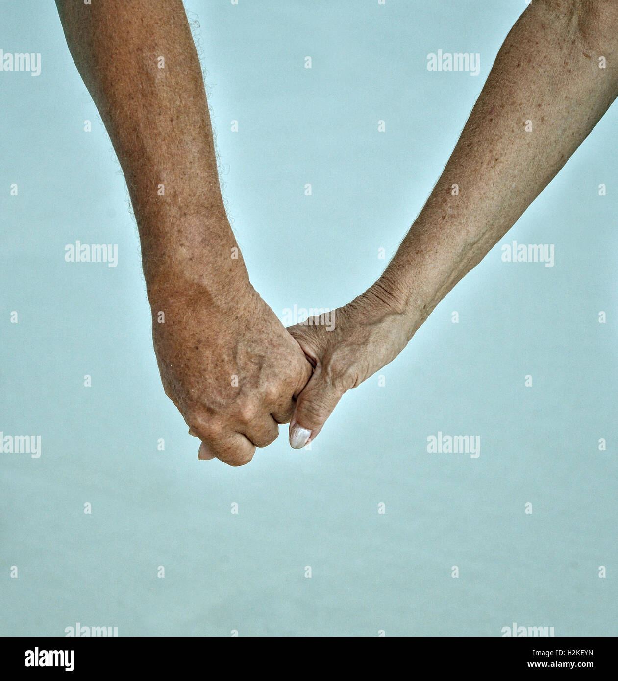 Hands held together Stock Photo - Alamy