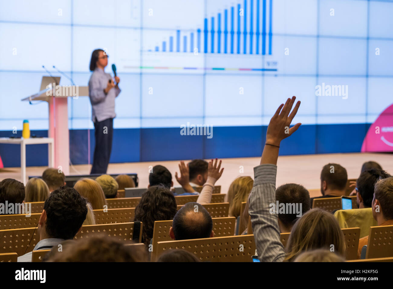 Audience listening a lecture Stock Photo - Alamy