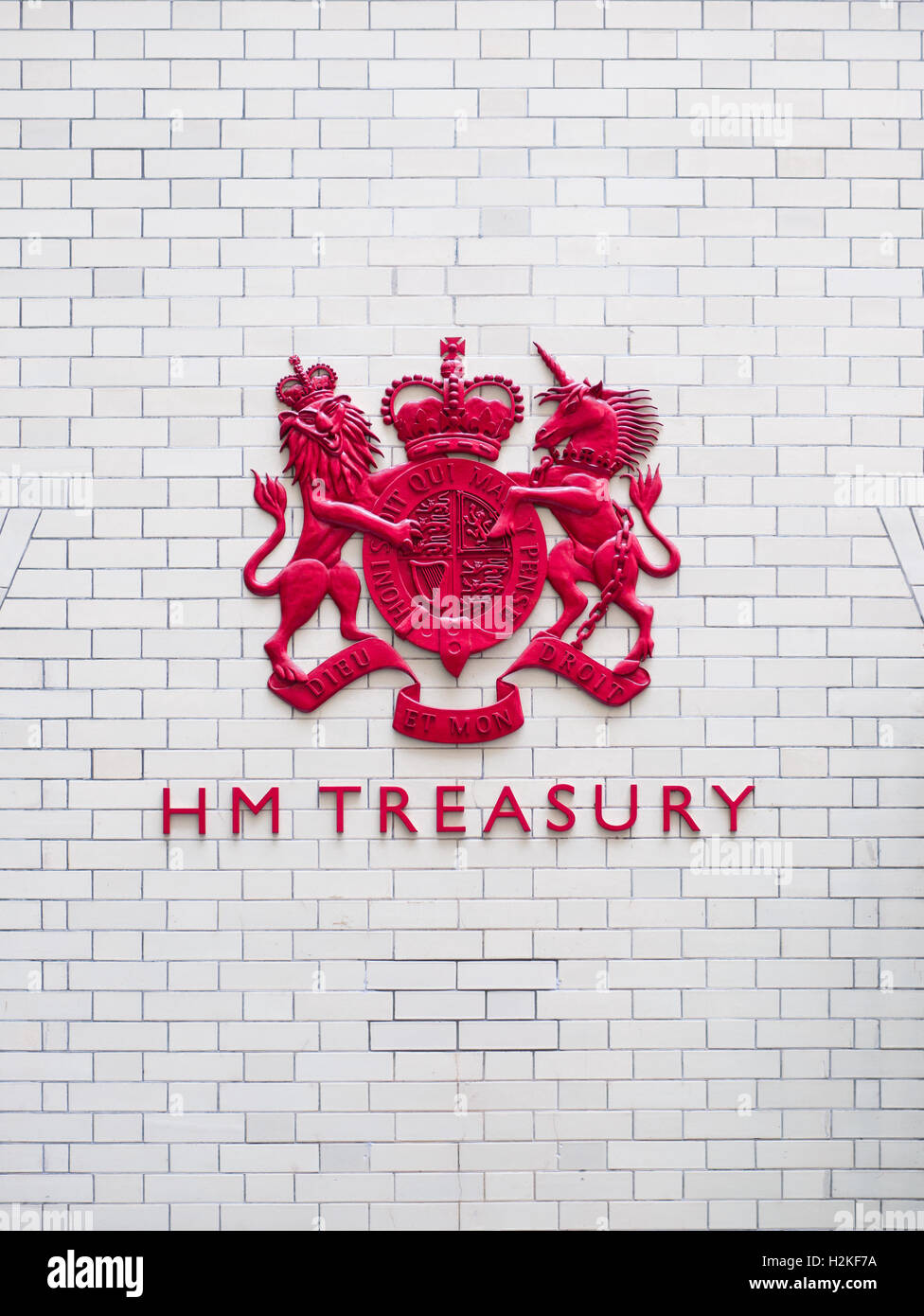 Red emblem on a tiled wall at the The Treasury, London, England Stock ...