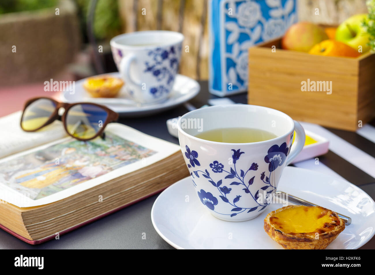 Relaxing afternoon tea outside Stock Photo - Alamy
