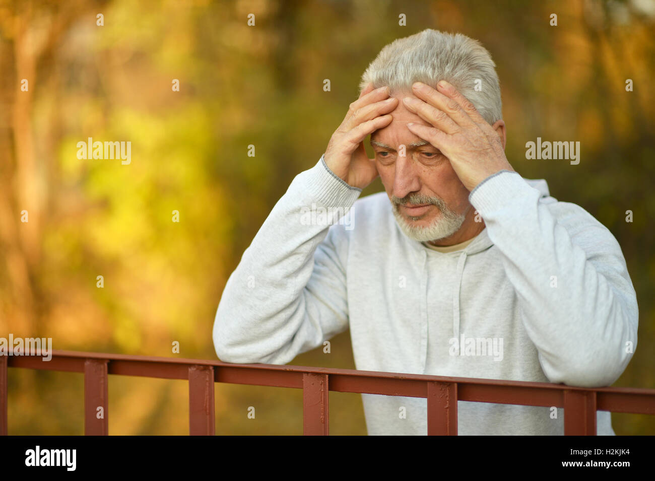 Senior man thinking Stock Photo - Alamy