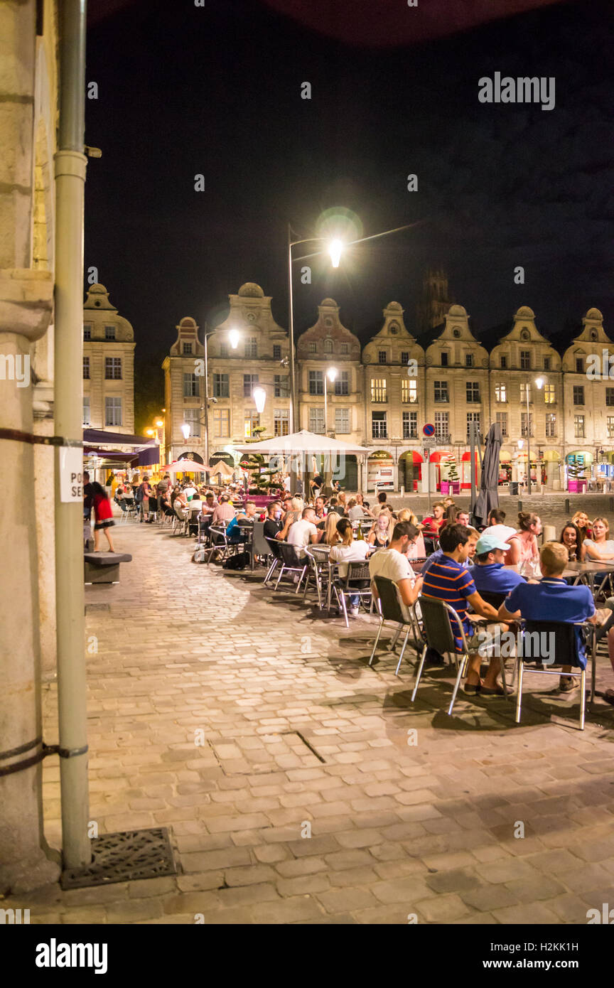 Drinkers outside bars, at dusk, Grand' Place, Arras, Pas-de-Calais ...