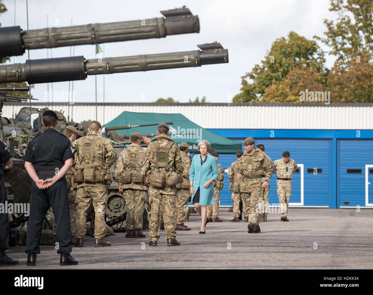 Prime Minister Theresa May greets troops as she visits 1st Battalion ...