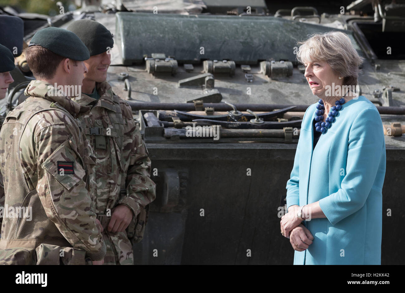 Prime Minister Theresa May greets troops as she visits 1st Battalion ...