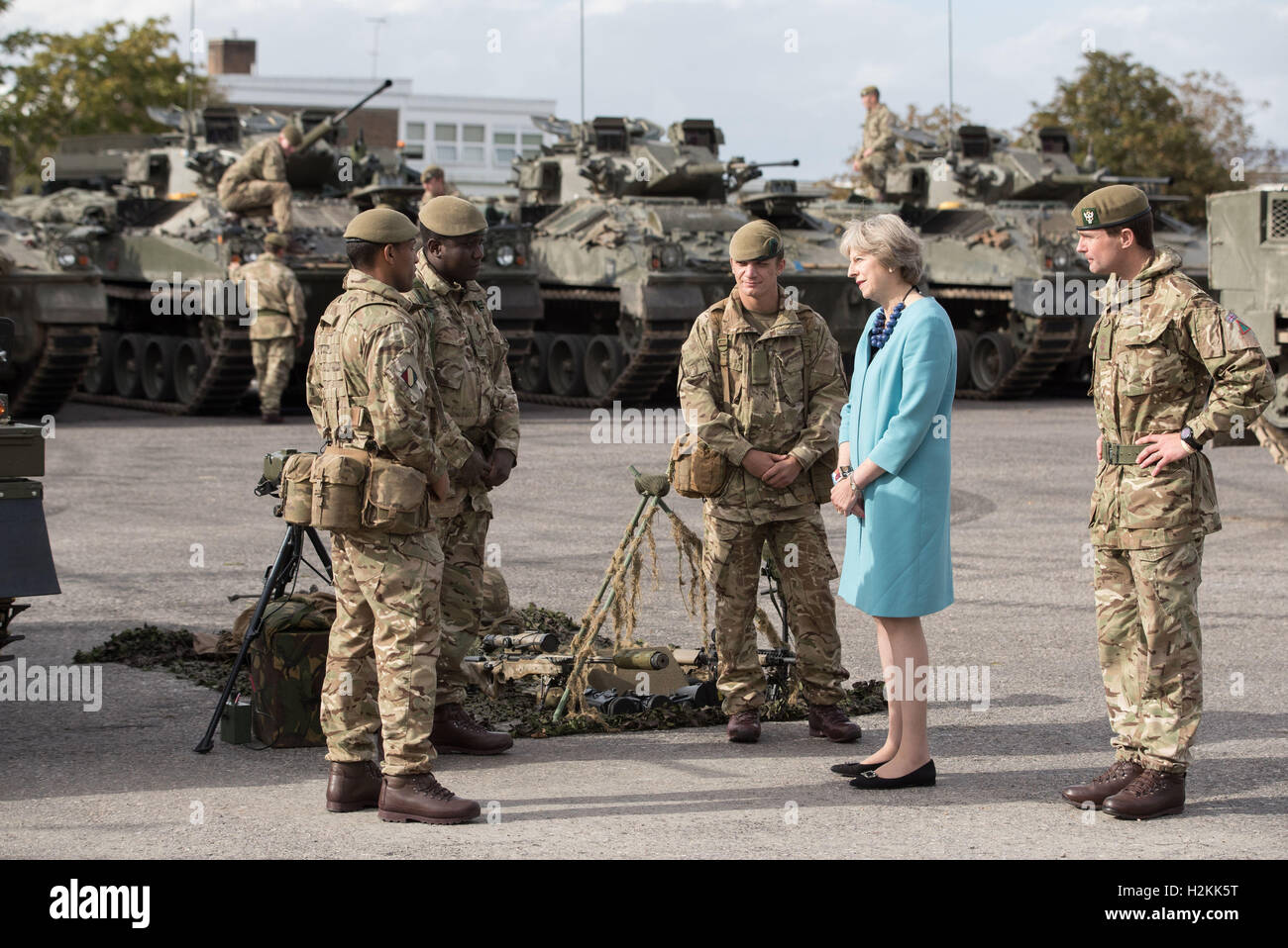Prime Minister Theresa May greets troops as she visits 1st Battalion ...