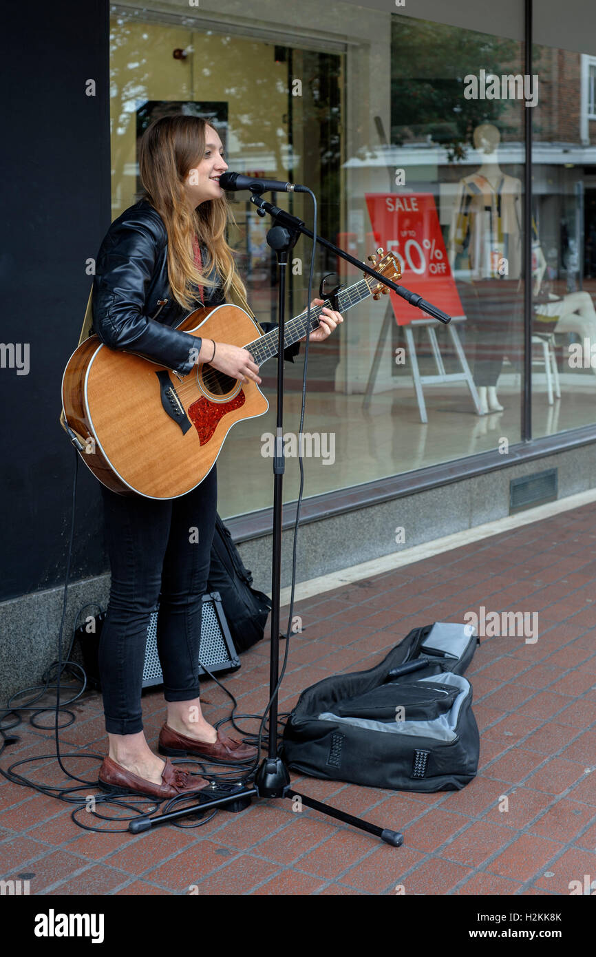 street busker performing in shopping center in england uk Stock Photo ...