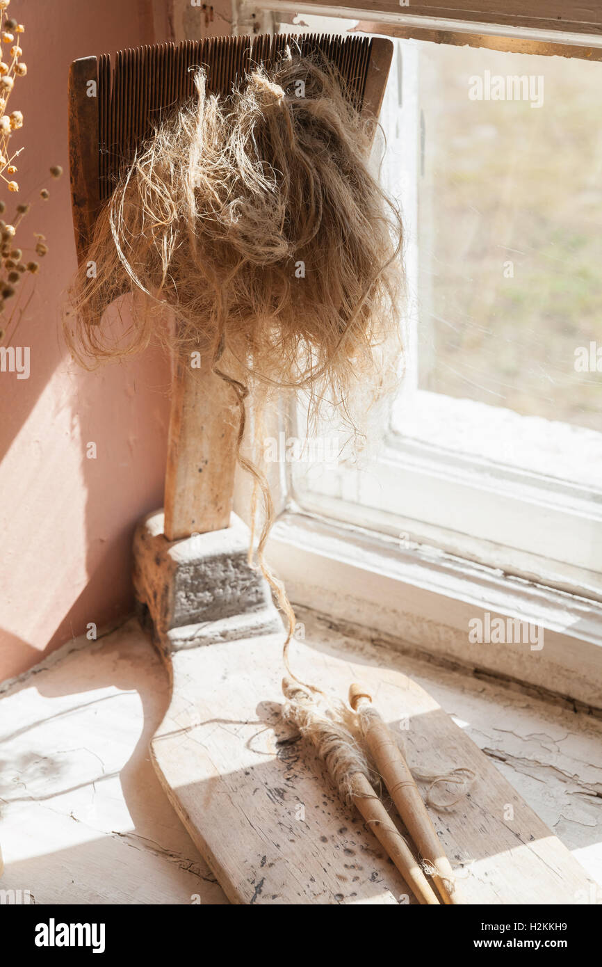 Ancient Russian wooden tool for hand spinning Stock Photo - Alamy